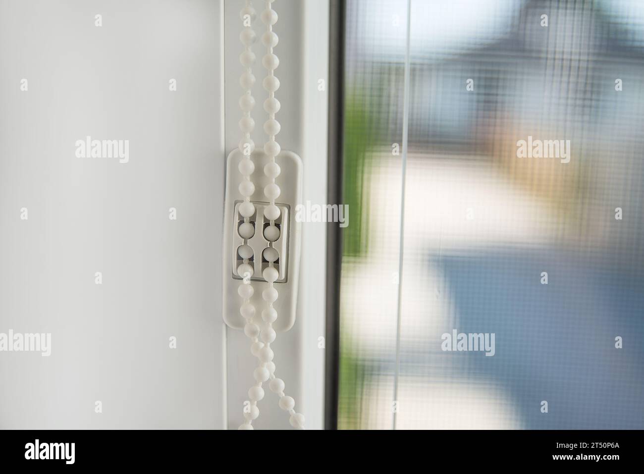 Blinds strings stop on the window Stock Photo - Alamy