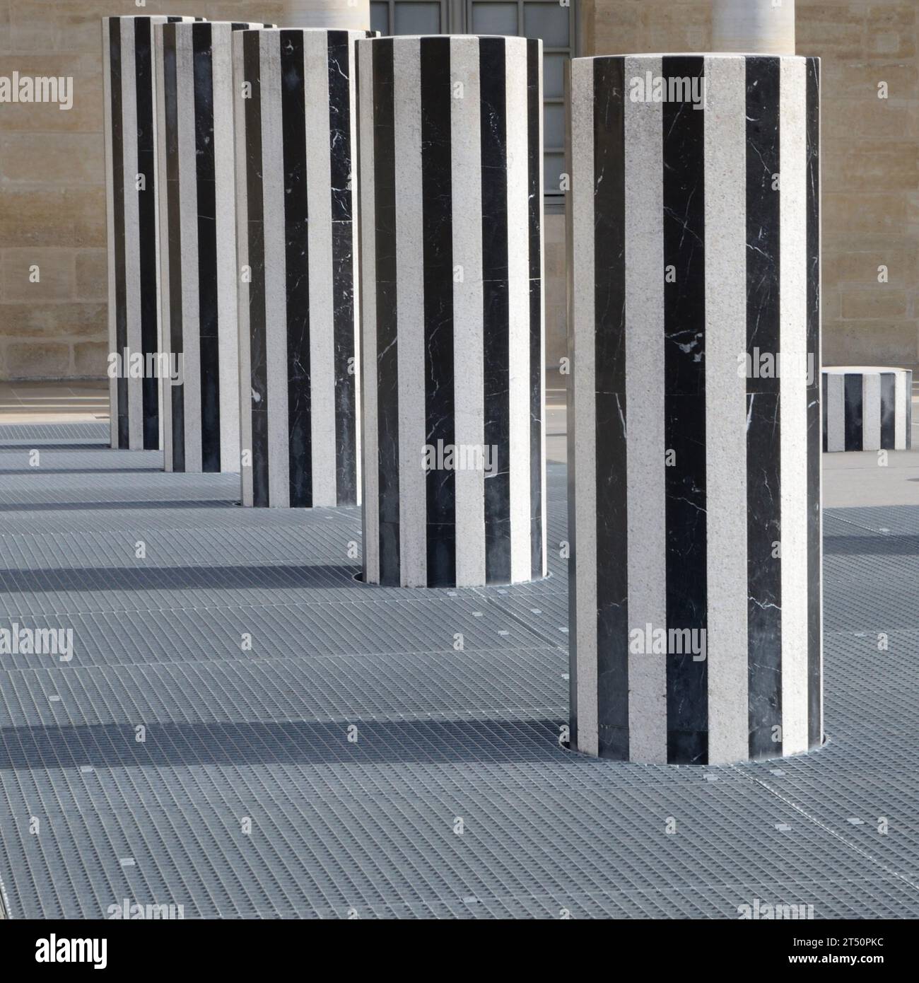 Paris, France - March 16, 2023: Black and white columns at Courtyard of ...