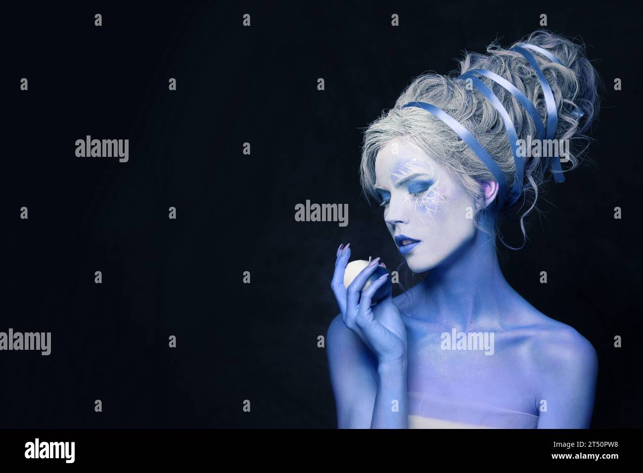 Portrait of pretty glamorous fashion model woman with blue skin on body ...