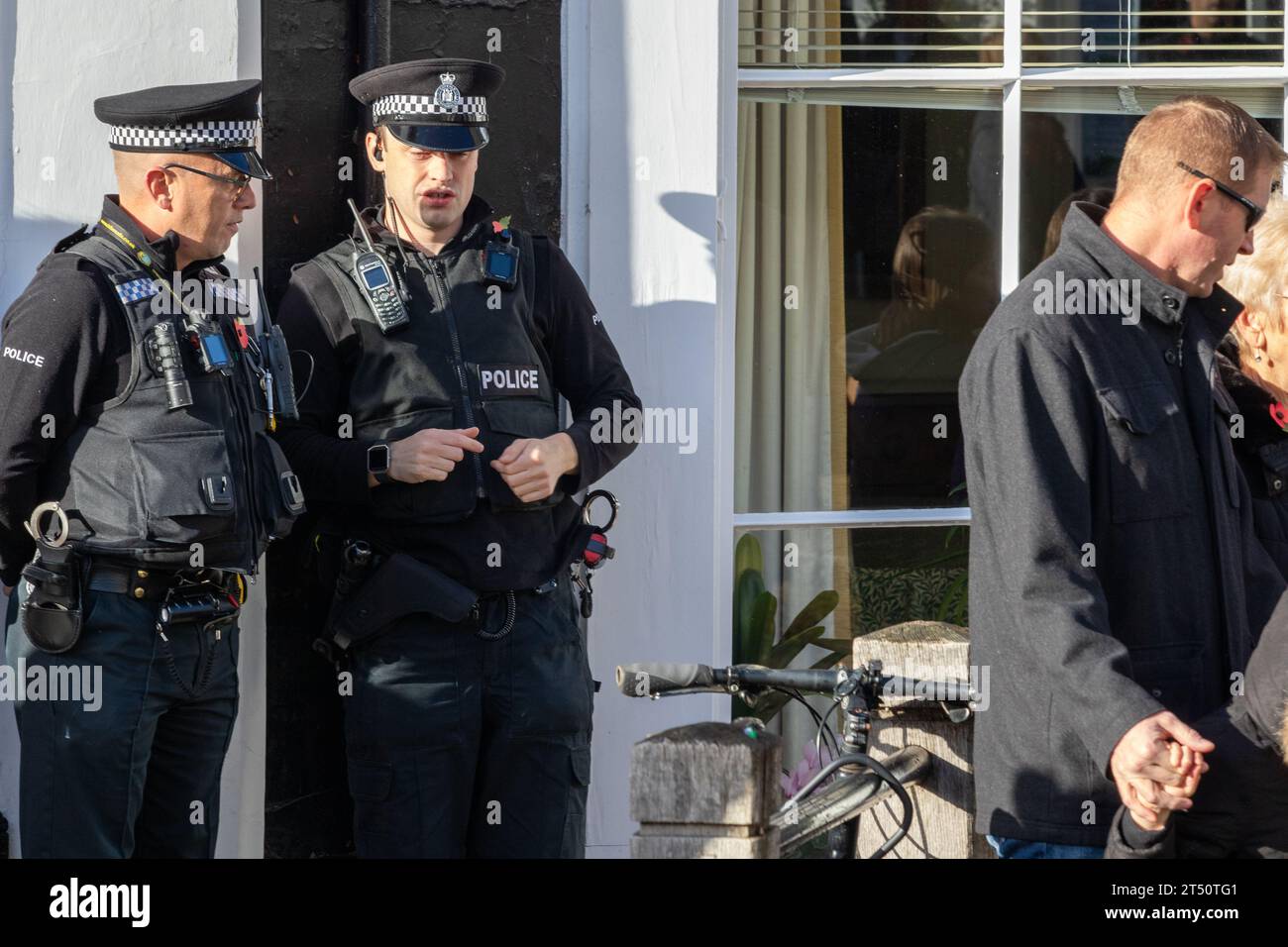 Two uniformed British police constables are a discrete presence at ...