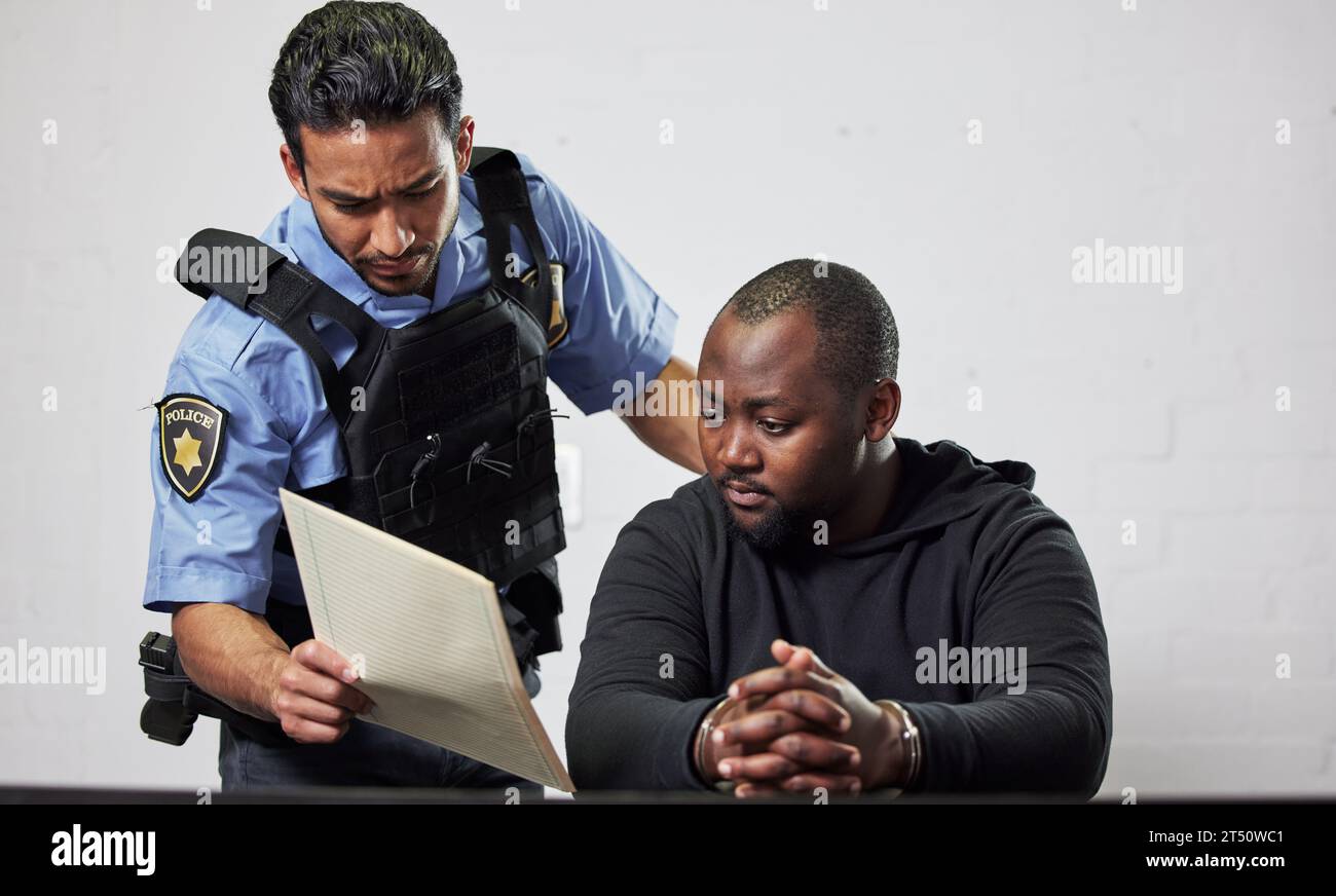 Policeman, criminal and handcuffs with documents for interrogation ...