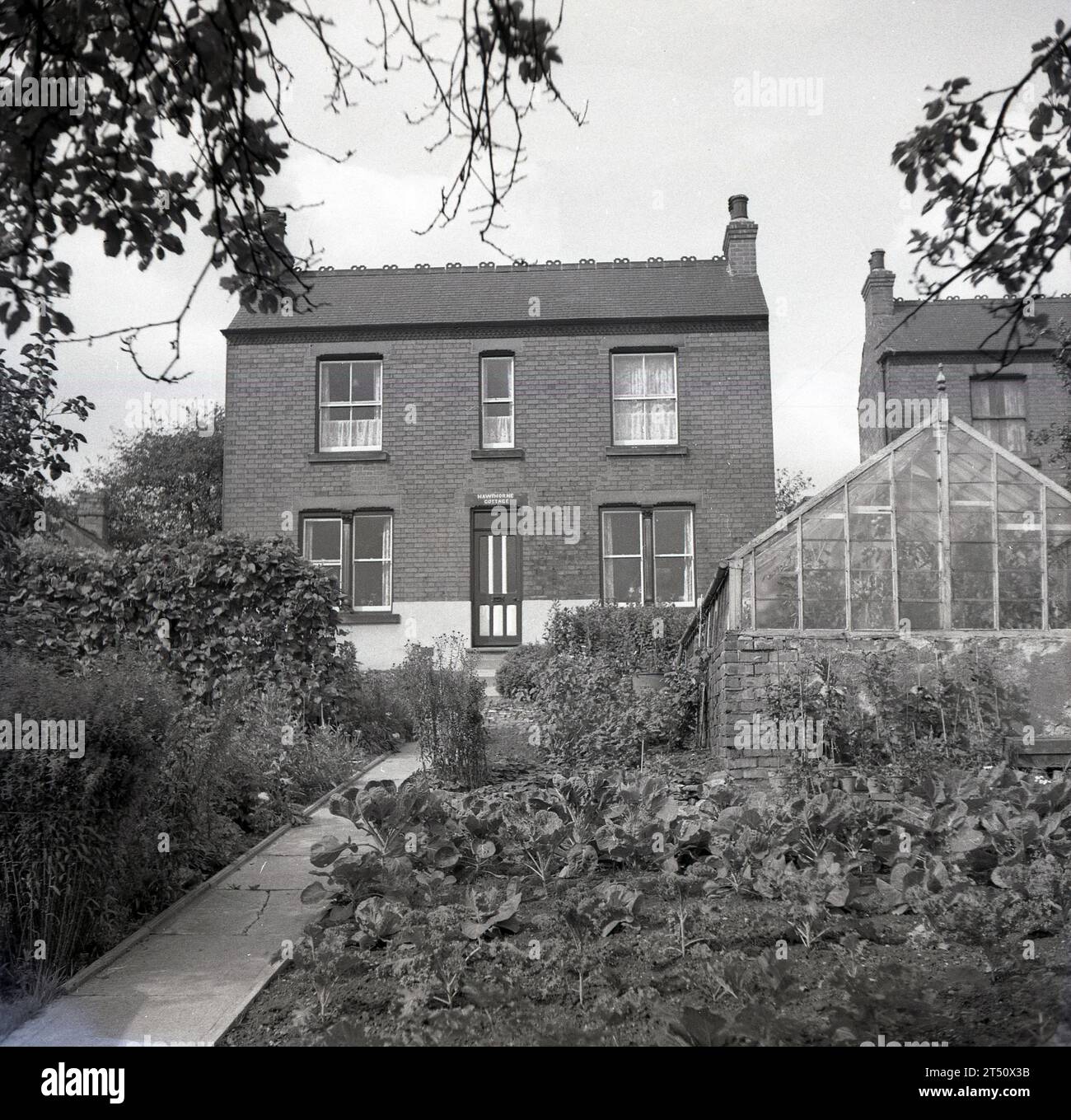 1950s, historical, view of a detached flat-fronted victorian brick ...