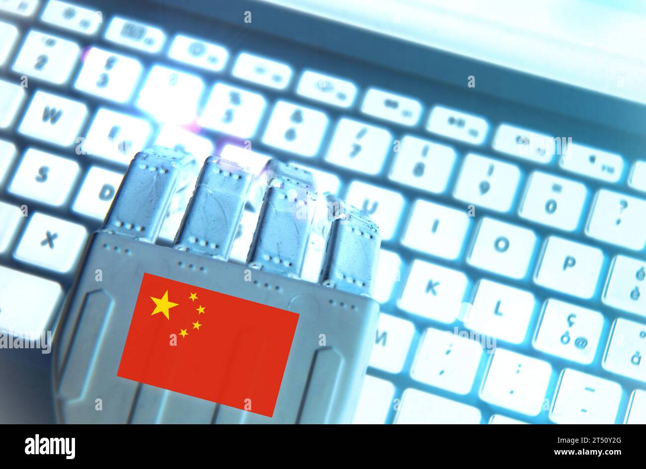 Robotic hand typing on a keyboard with the Chinese Flag. Concept of ...