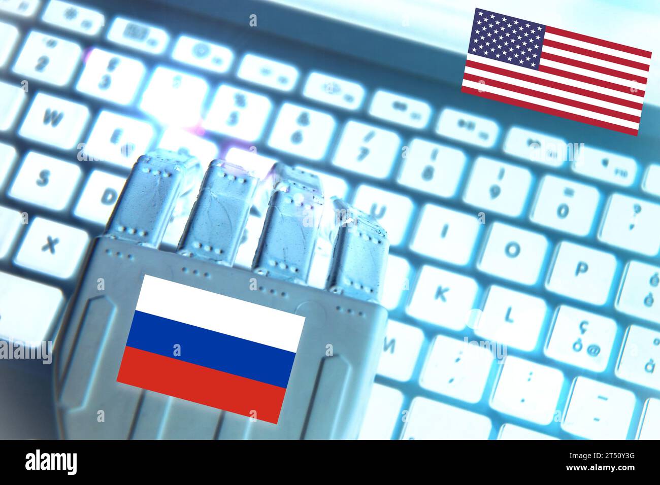 Robotic hand with the Russian flag typing on a keyboard against he ...