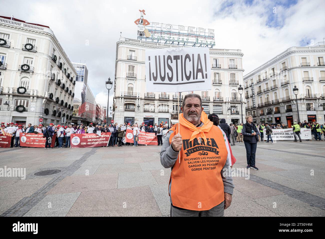 A protester holds a placard expressing opinion during the demonstration ...