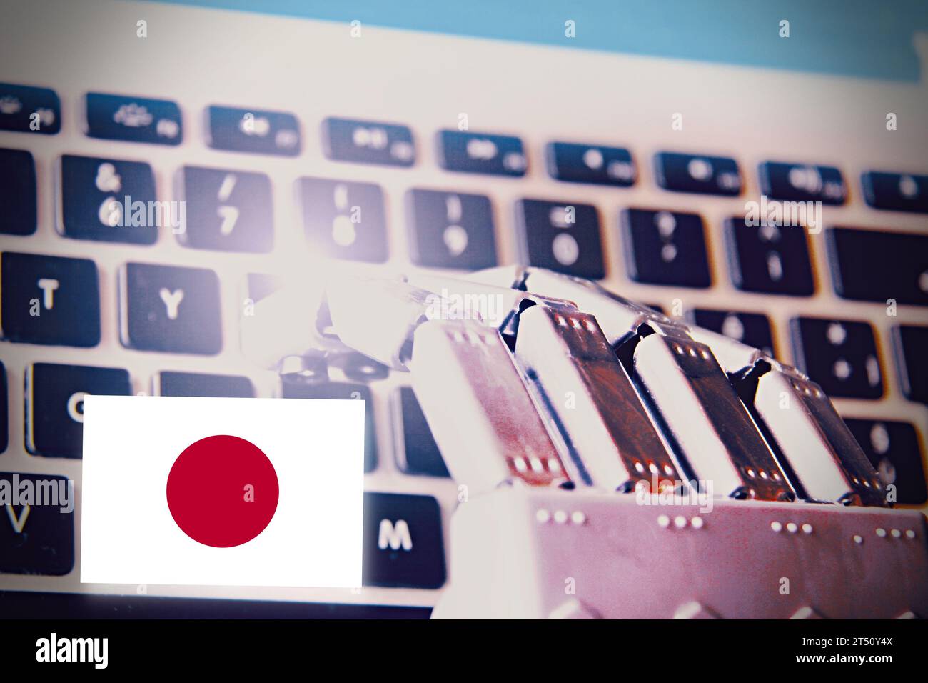Robotic hand typing on a keyboard with the Japanese Flag. Concept of ...