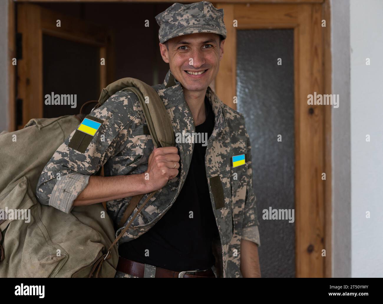 Ukrainian soldier wearing military uniform with flag and chevron ...