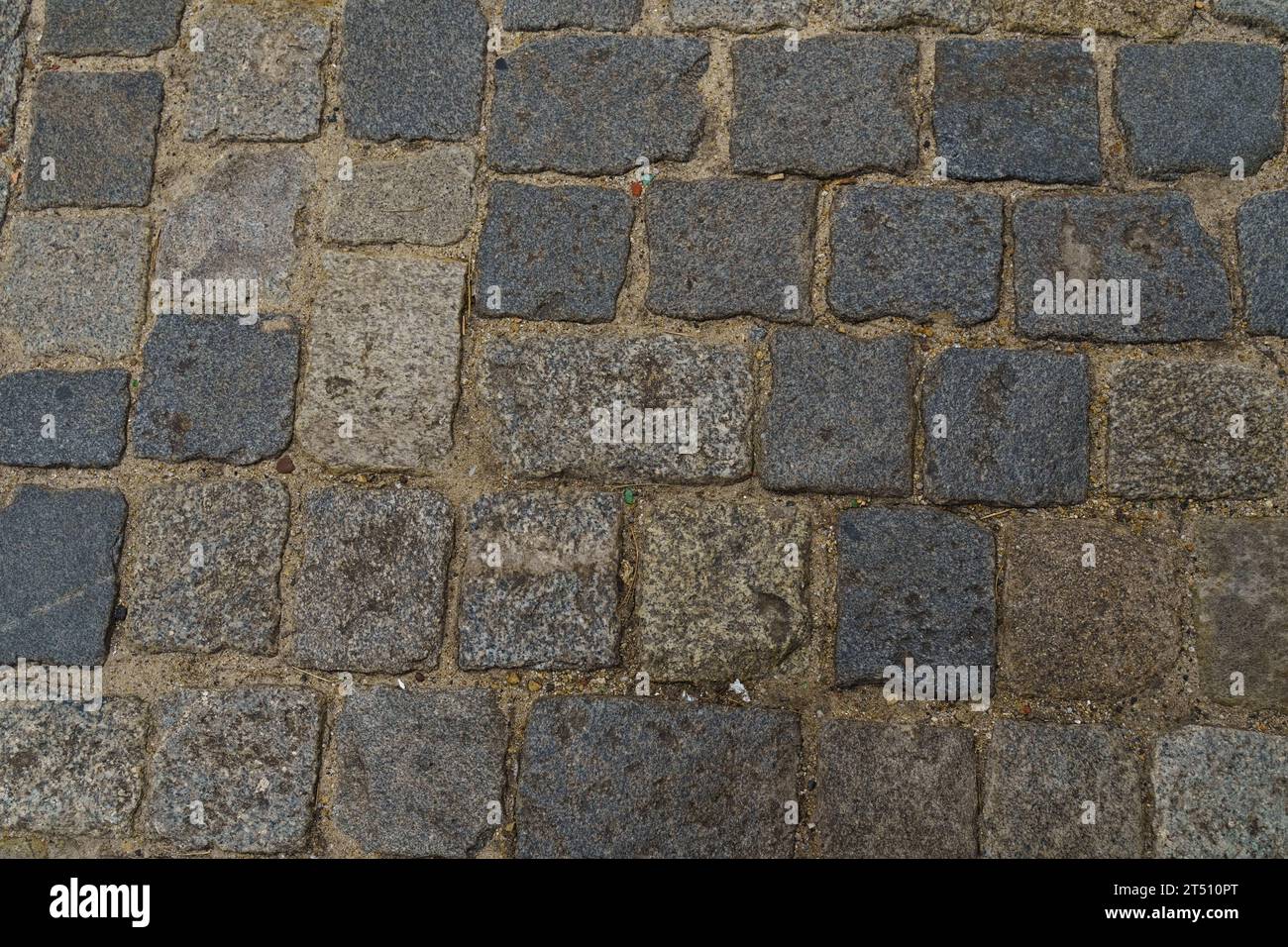 The road is paved with square granite stones. View from above Stock ...