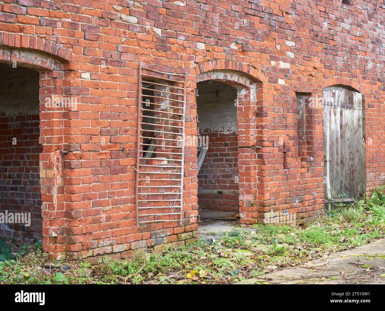 Old abandoned brick buildings on a farm Stock Photo - Alamy