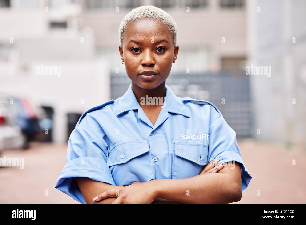 Portrait, black woman and security guard with arms crossed for ...