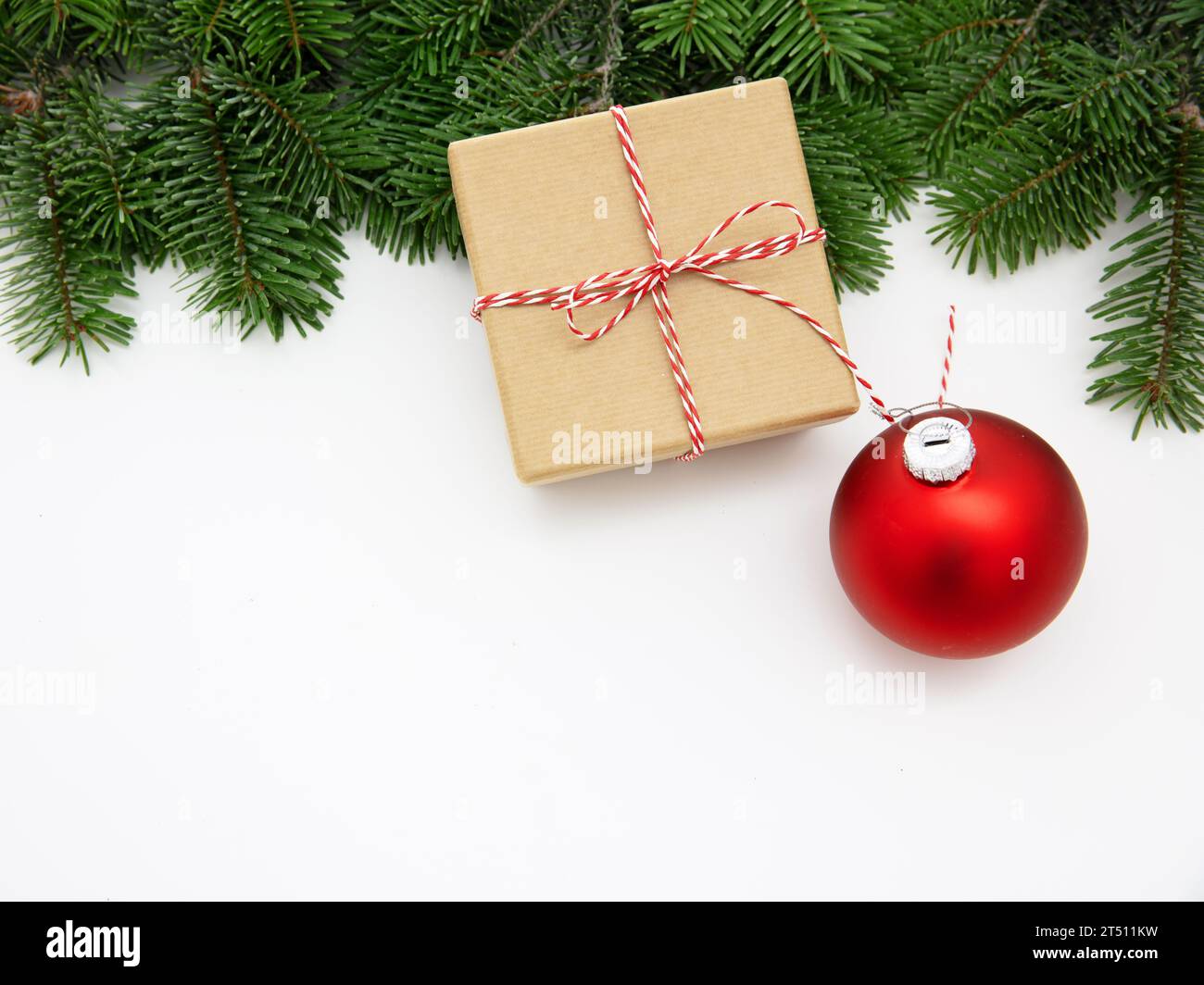 Christmas background. Xmas tree branch gift box and decoration isolated ...