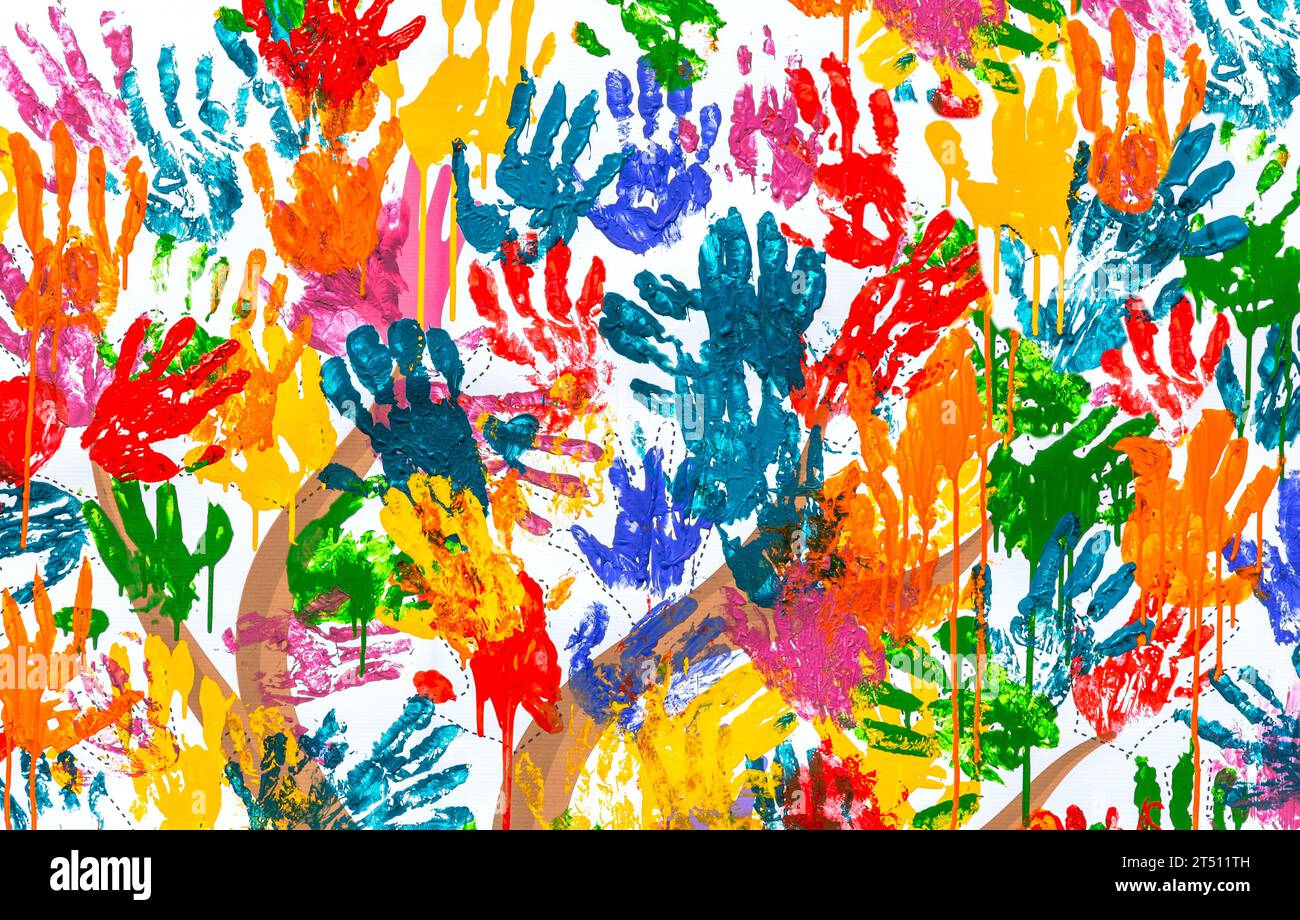 Multicolored colorful handprints on the wall as a creative background ...