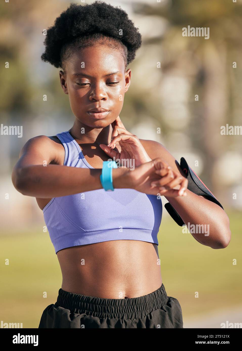 Fitness, exercise and woman checking her pulse with smartwatch for ...