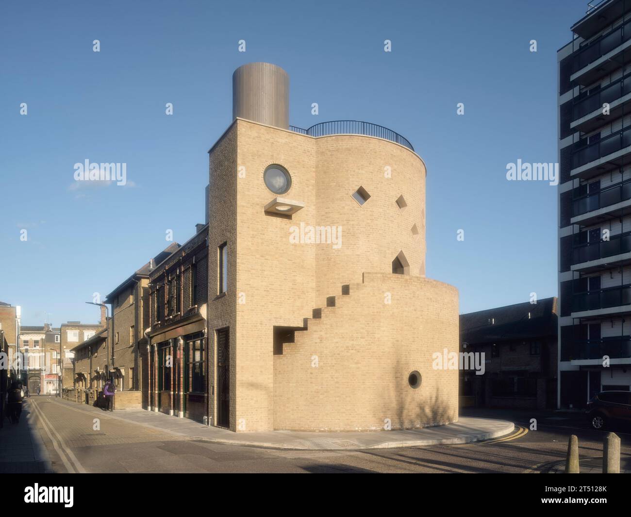 Street view with end-of-terrace new building. The Hoxton Mule - Ivy ...