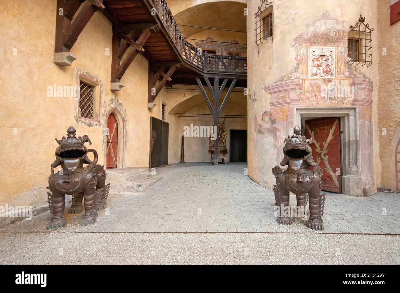 Lion statues from Nepal in the courtyard of Brunico Castle, home of the ...