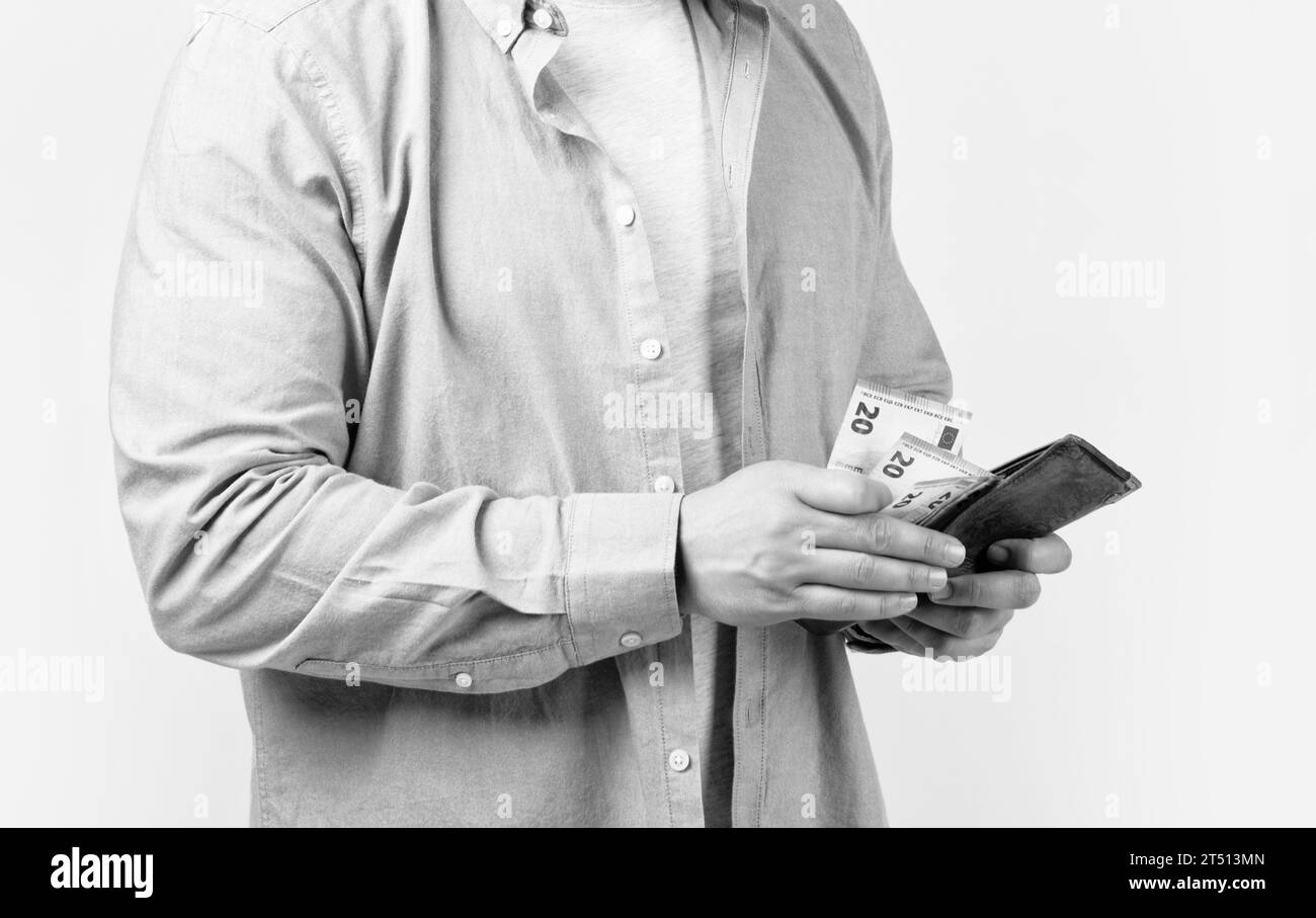 cropped view of man pay money in studio. man pay money banknotes Stock ...