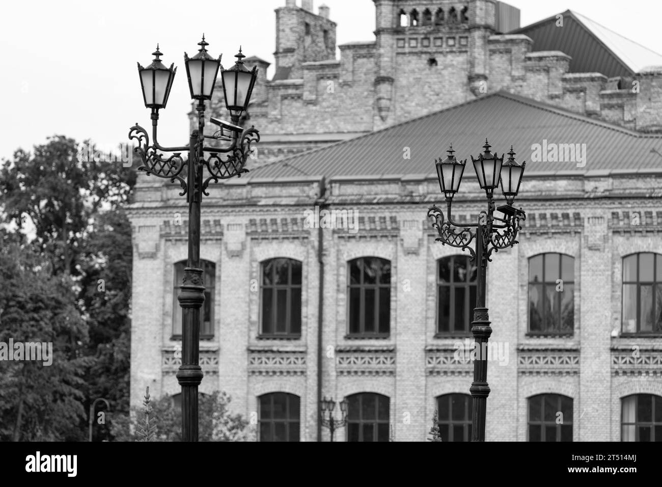 Streetlights lamp posts with brick house facade exterior of historical ...