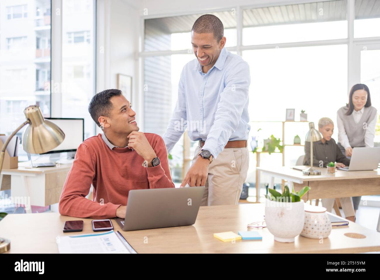 Leadership, laptop or laughing manager coaching a worker in startup or ...