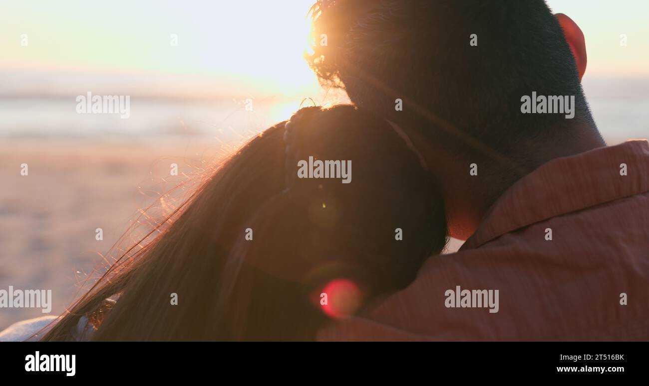 Sunset, beach and back of couple hug in nature for travel, bond or ...