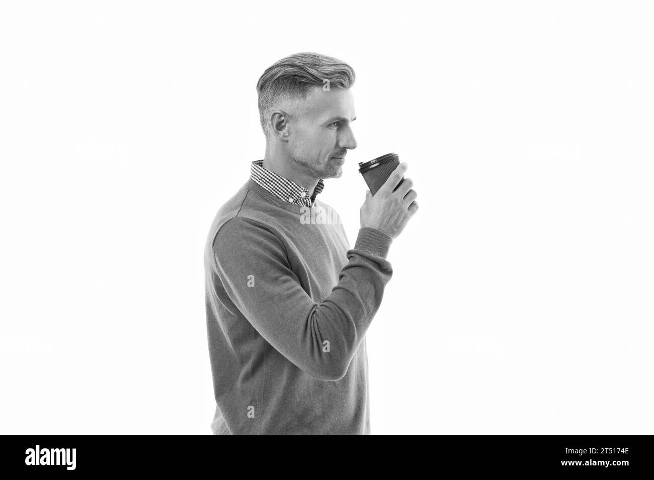 man drinking coffee isolated on white. man drinking coffee in studio ...