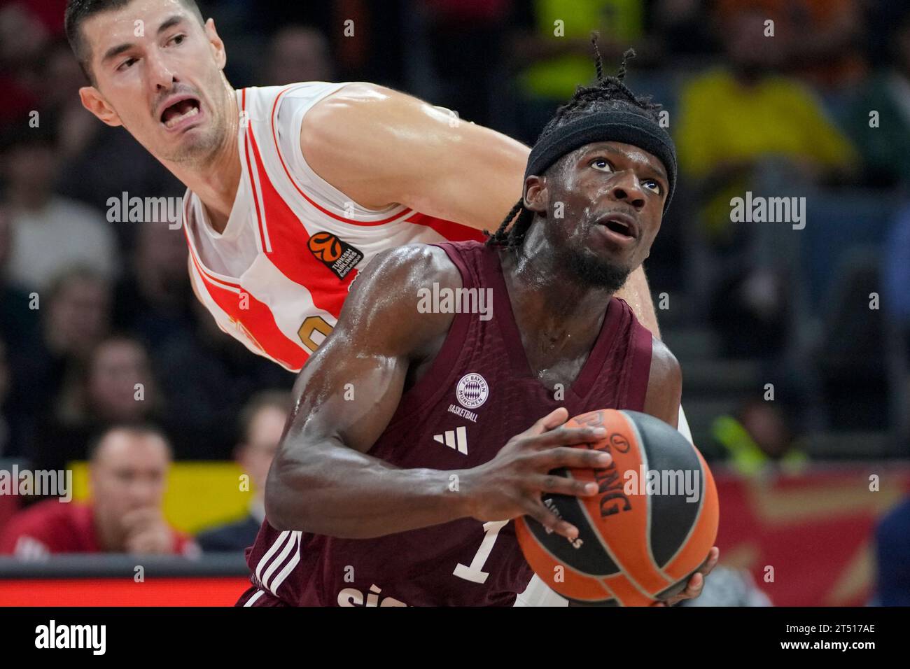 Bayern Munich's Sylvain Francisco, front, drives to the basket as Red ...