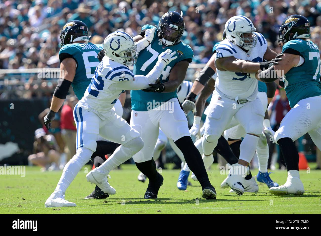 Indianapolis Colts defensive end Jake Martin, left, and defensive ...