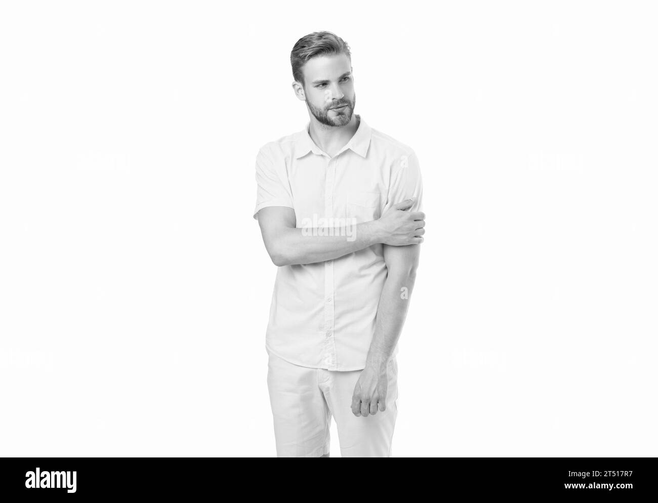 trendy man in white studio. photo of trendy man wearing yellow shirt ...