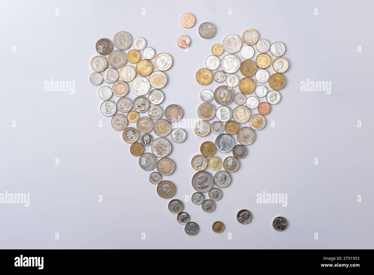 heart-shaped arrangement crafted from coins originating from different ...