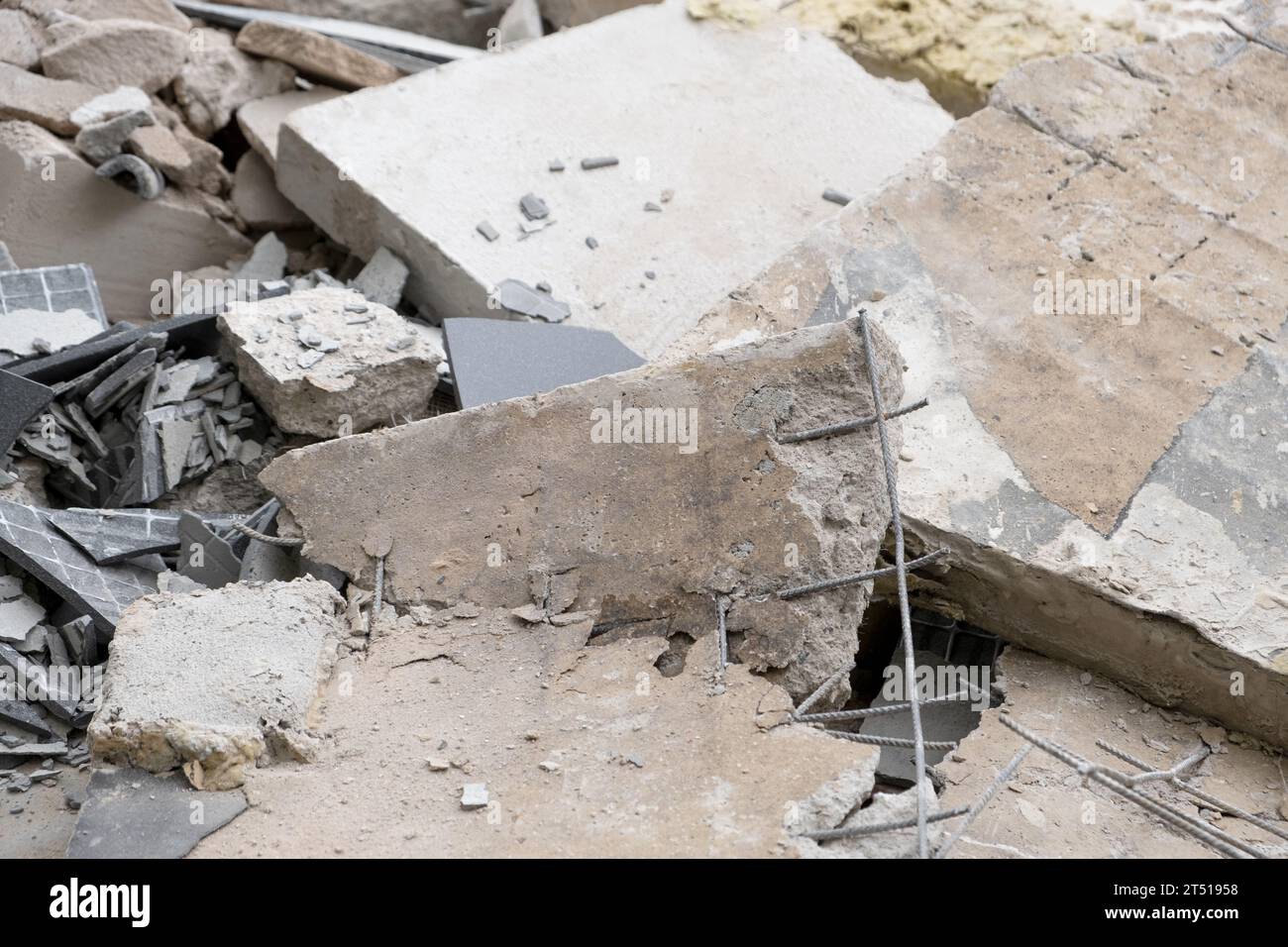 Shattered, broken wall bricks, construction waste after building ...