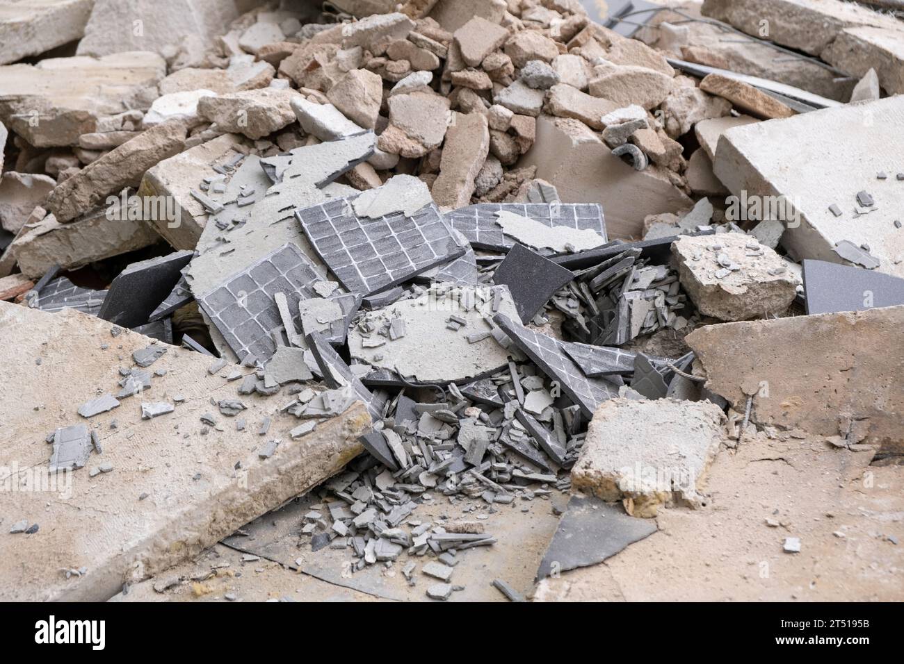 Shattered, broken wall bricks, construction waste after building ...