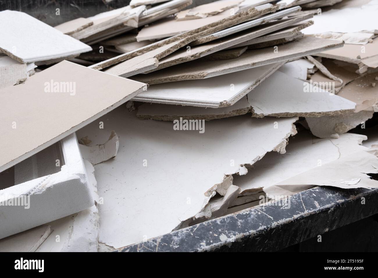 A huge overloaded dumpster waste container, overflowing with ...