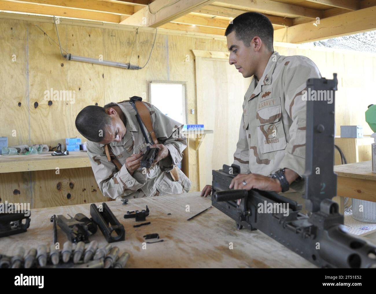 .50-caliber machine gun, disassemble, M2H, Naval Mobile Construction ...