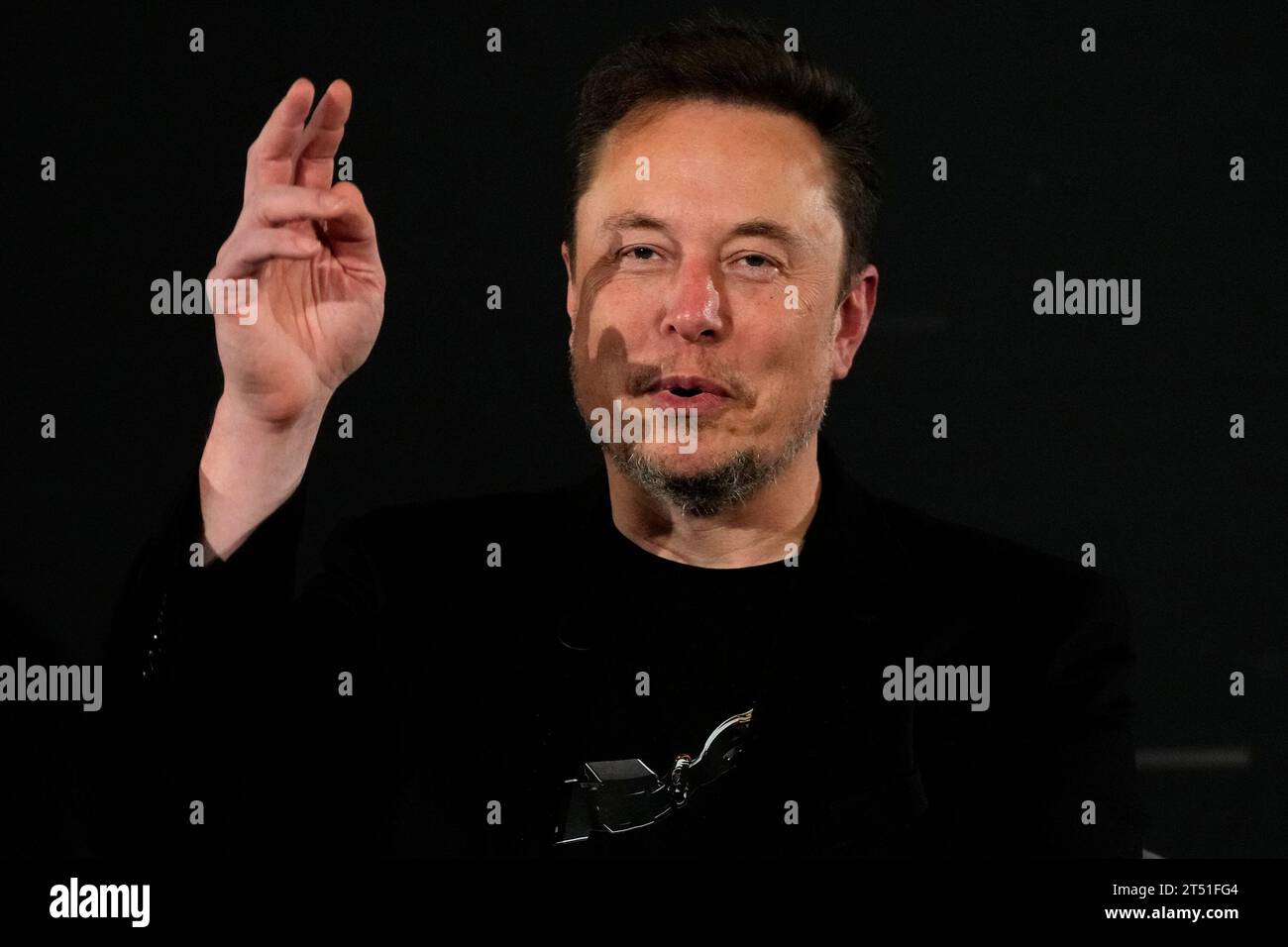 Elon Musk, CEO of Tesla and SpaceX gestures during an 'in-conversation ...