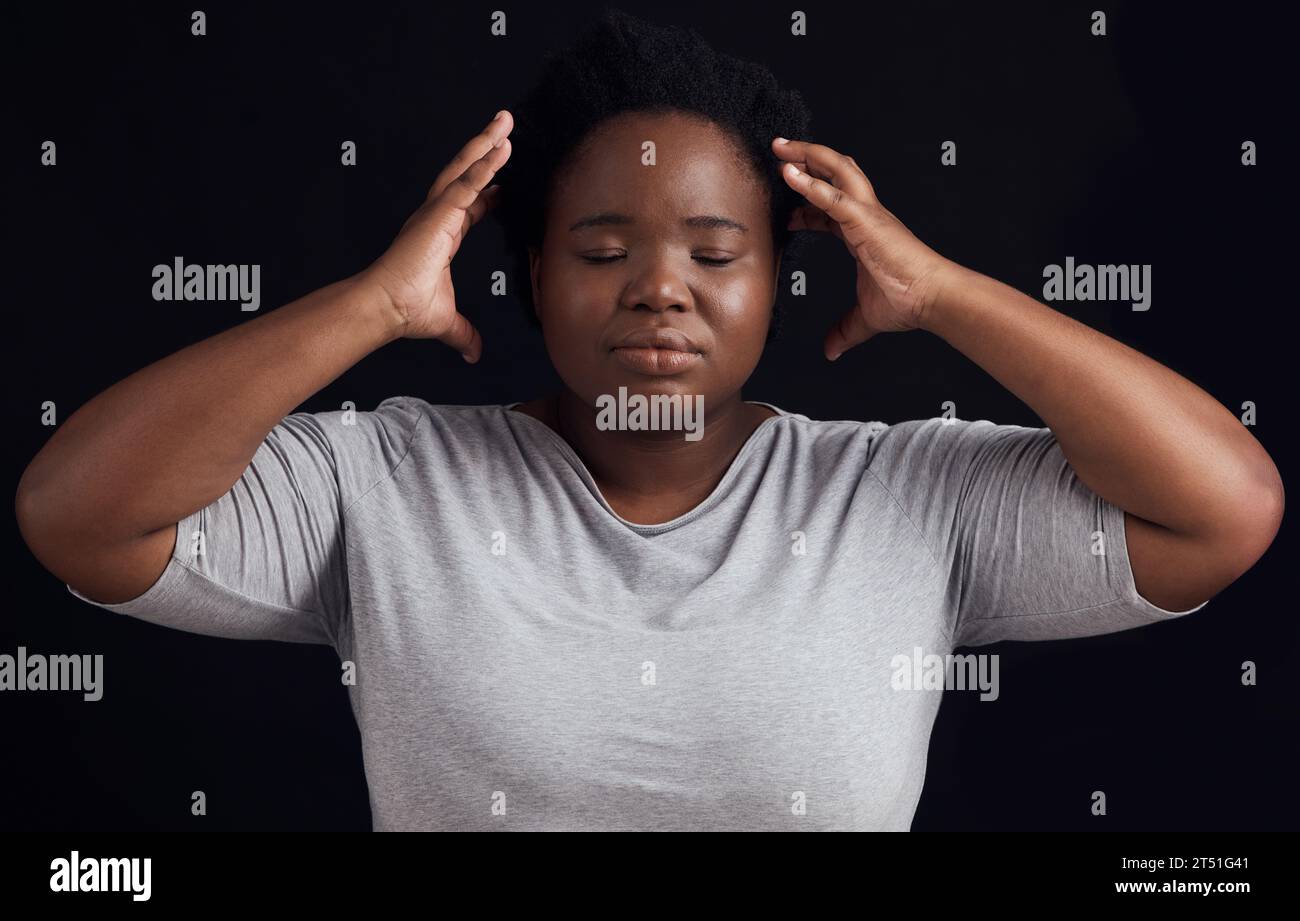 Frustrated black woman, stress and anxiety in studio with fear of crazy ...
