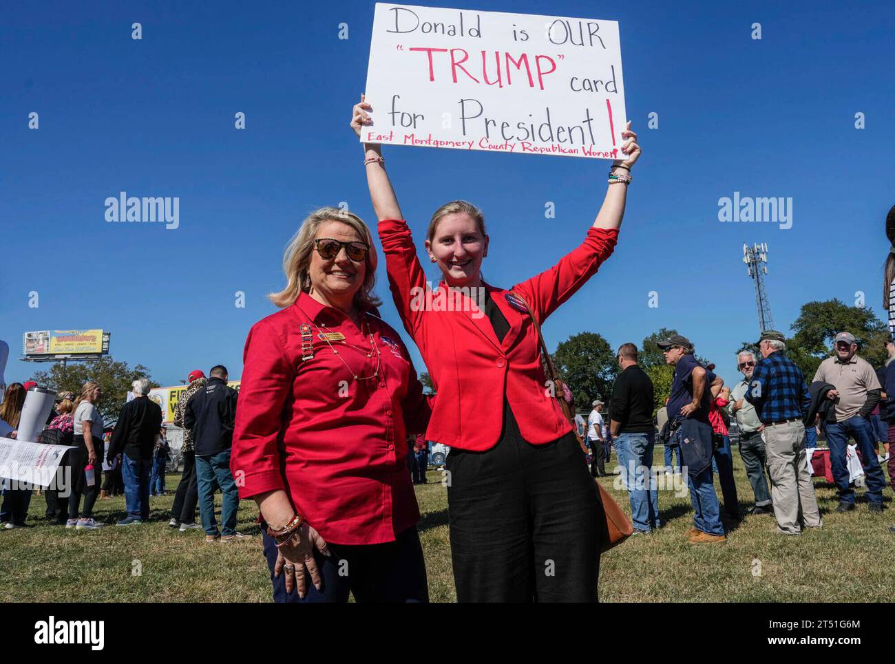 Holly Juneau, 60, stands with Vanessa Moore, 19, in line as they wait ...