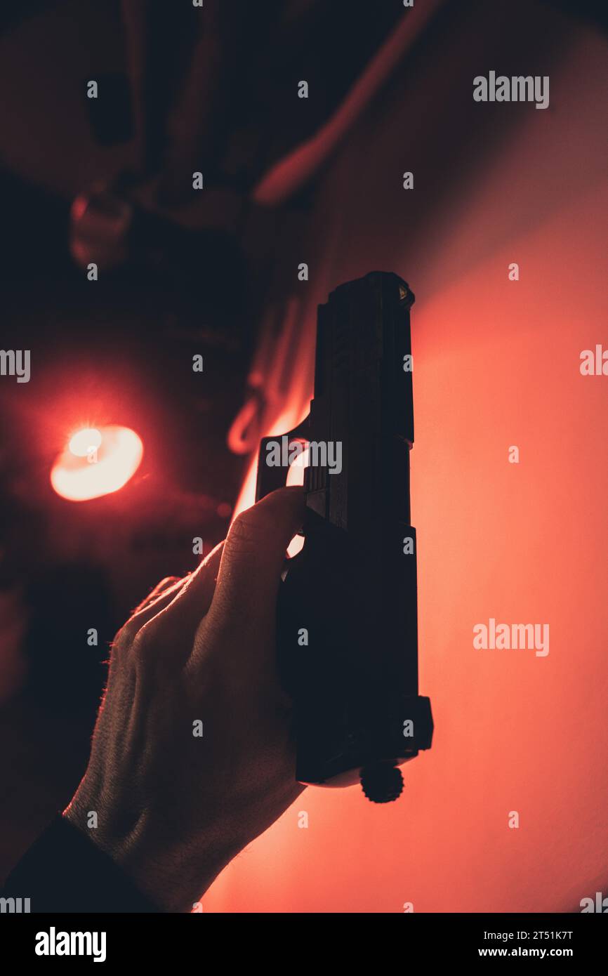 Pistol gun artistic photograph book cover design Stock Photo - Alamy