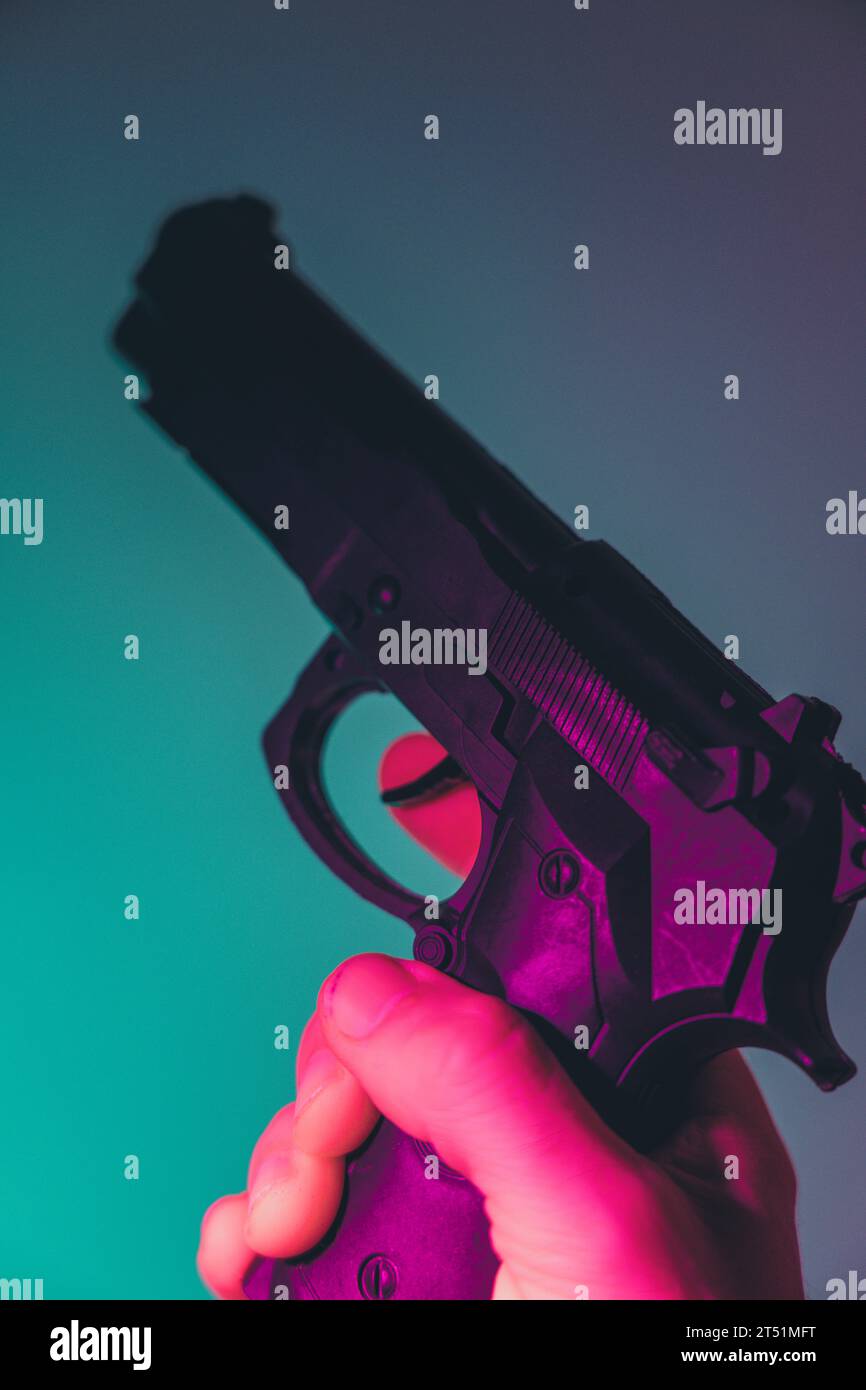 Pistol gun artistic photograph book cover design Stock Photo - Alamy