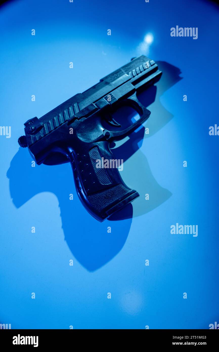 Pistol gun artistic photograph book cover design Stock Photo - Alamy