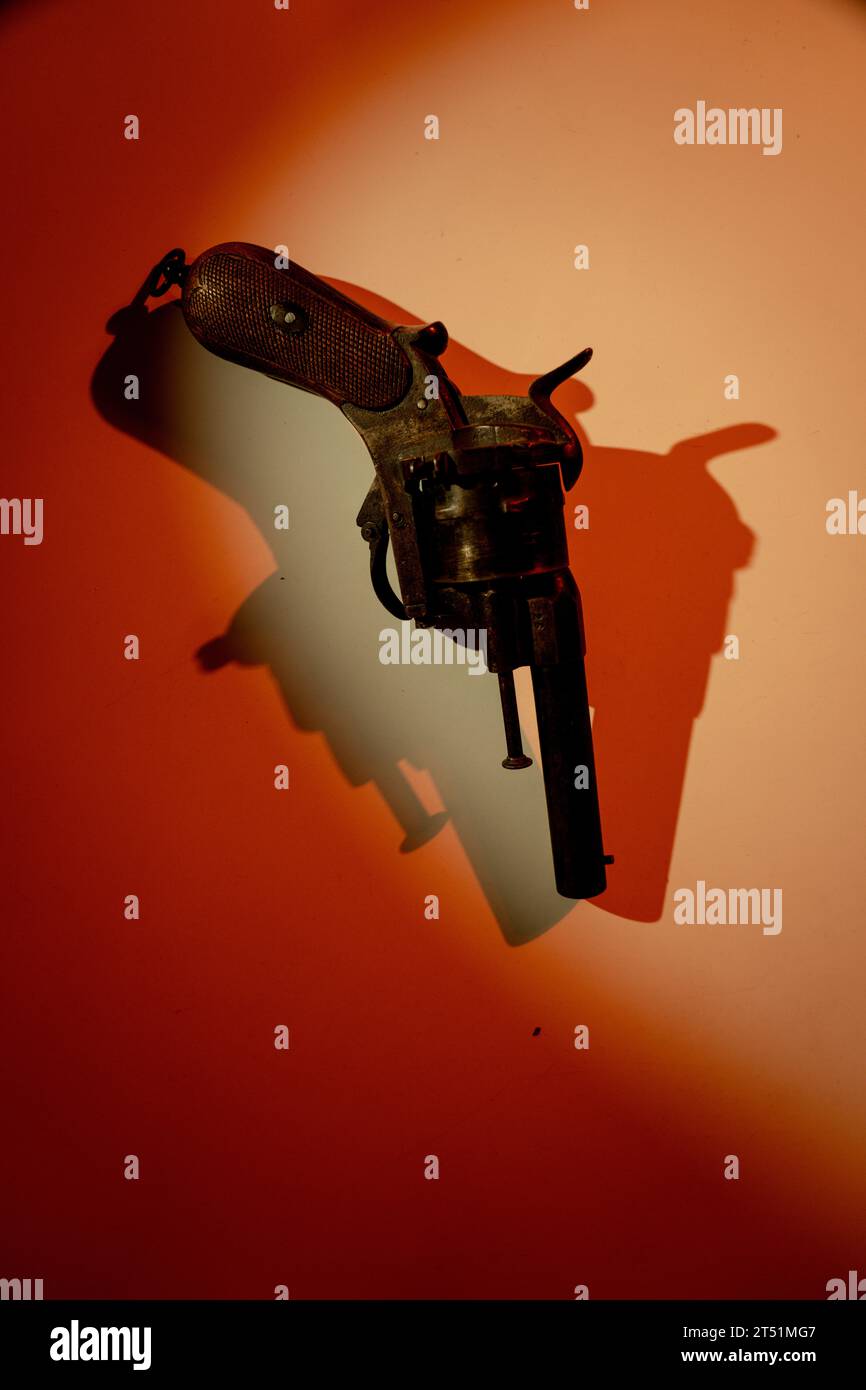 Pistol gun artistic photograph book cover design Stock Photo - Alamy