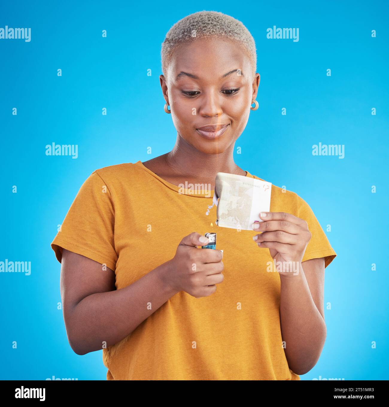 Woman burning money hi-res stock photography and images - Alamy