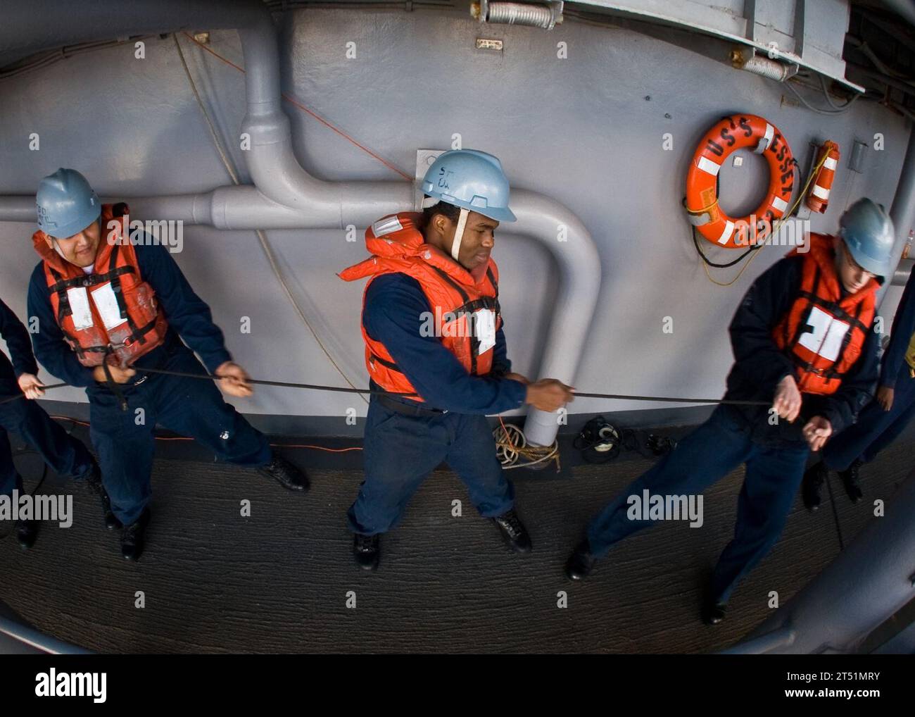 0907185253W-003 CORAL SEA (July 18, 2009) Sailors aboard the amphibious ...