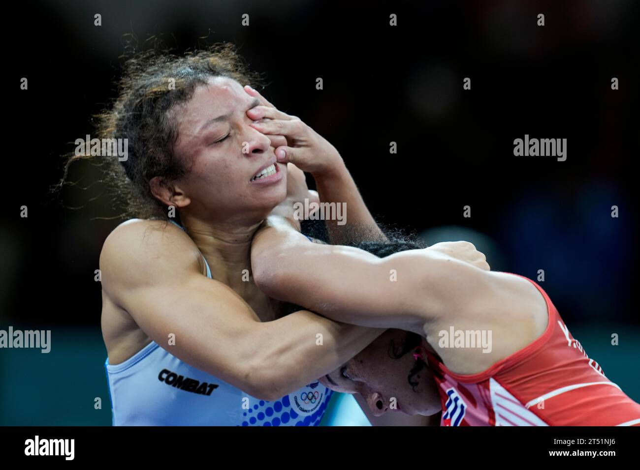 Cuba's Yusneylis Guzman, right, and Ecuador's Jacqueline Mollocana ...