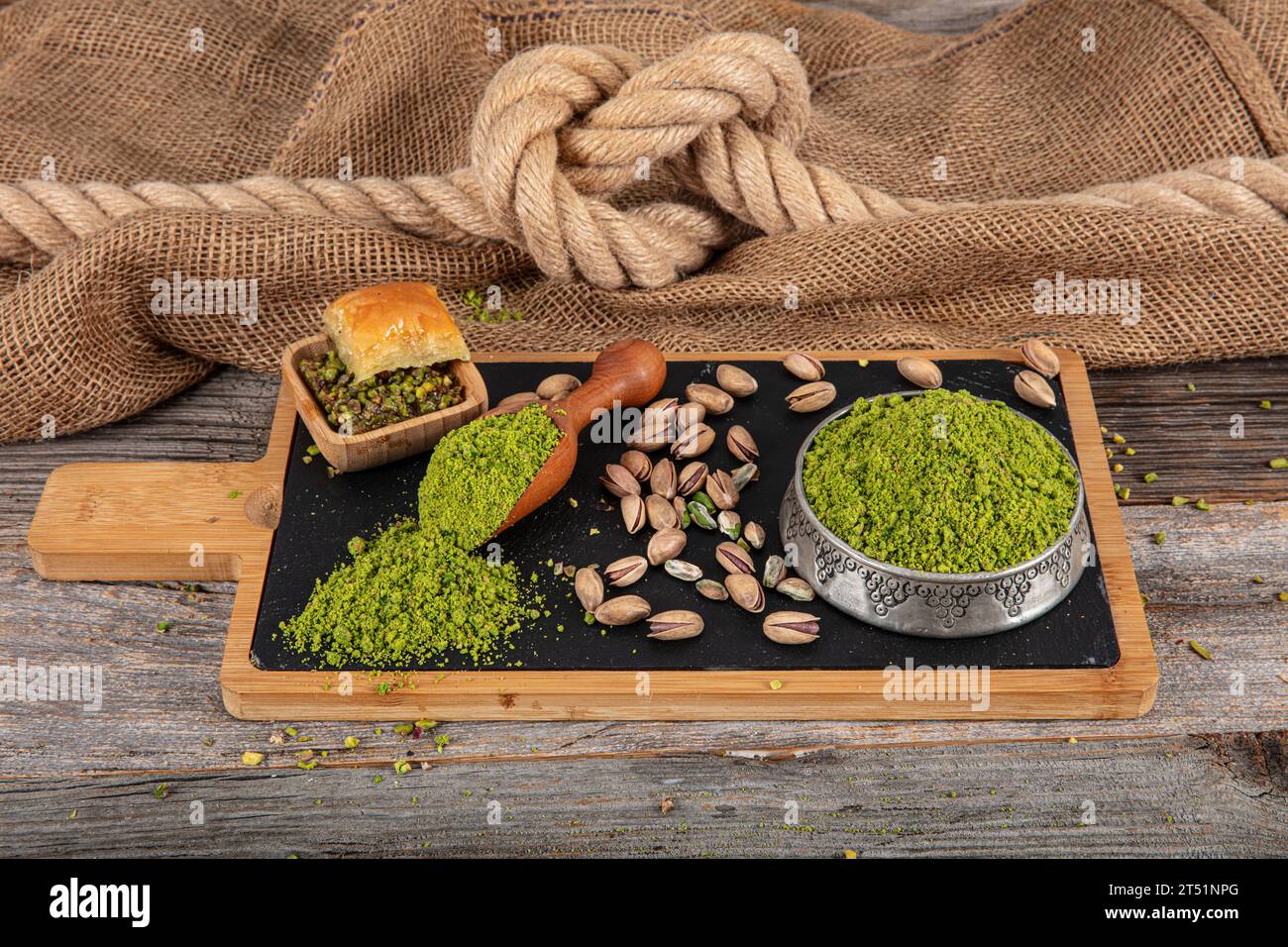 Pistachio powder. Ground, milled, crushed or granulated pistachio pile ...