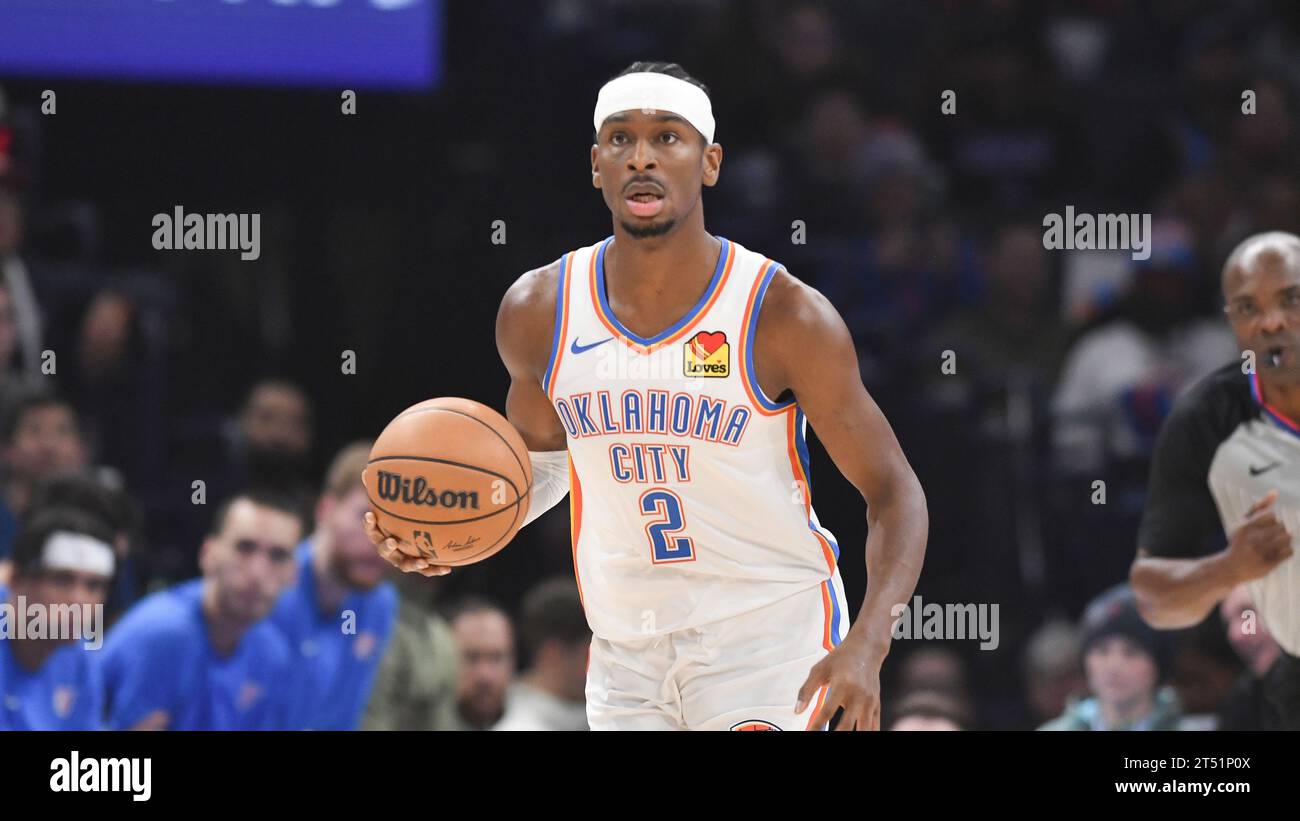 Oklahoma City Thunder guard Shai Gilgeous-Alexander pushes down the ...
