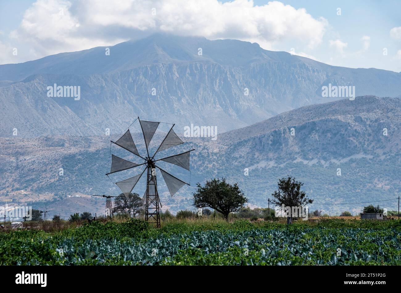 Lasithi plateau, Crete, Greece. 30.09.2023 Windmills, distant mountains ...