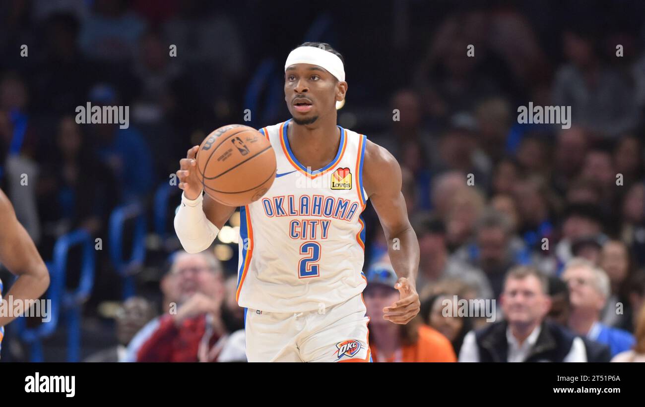 Oklahoma City Thunder guard Shai Gilgeous-Alexander pushes down the ...