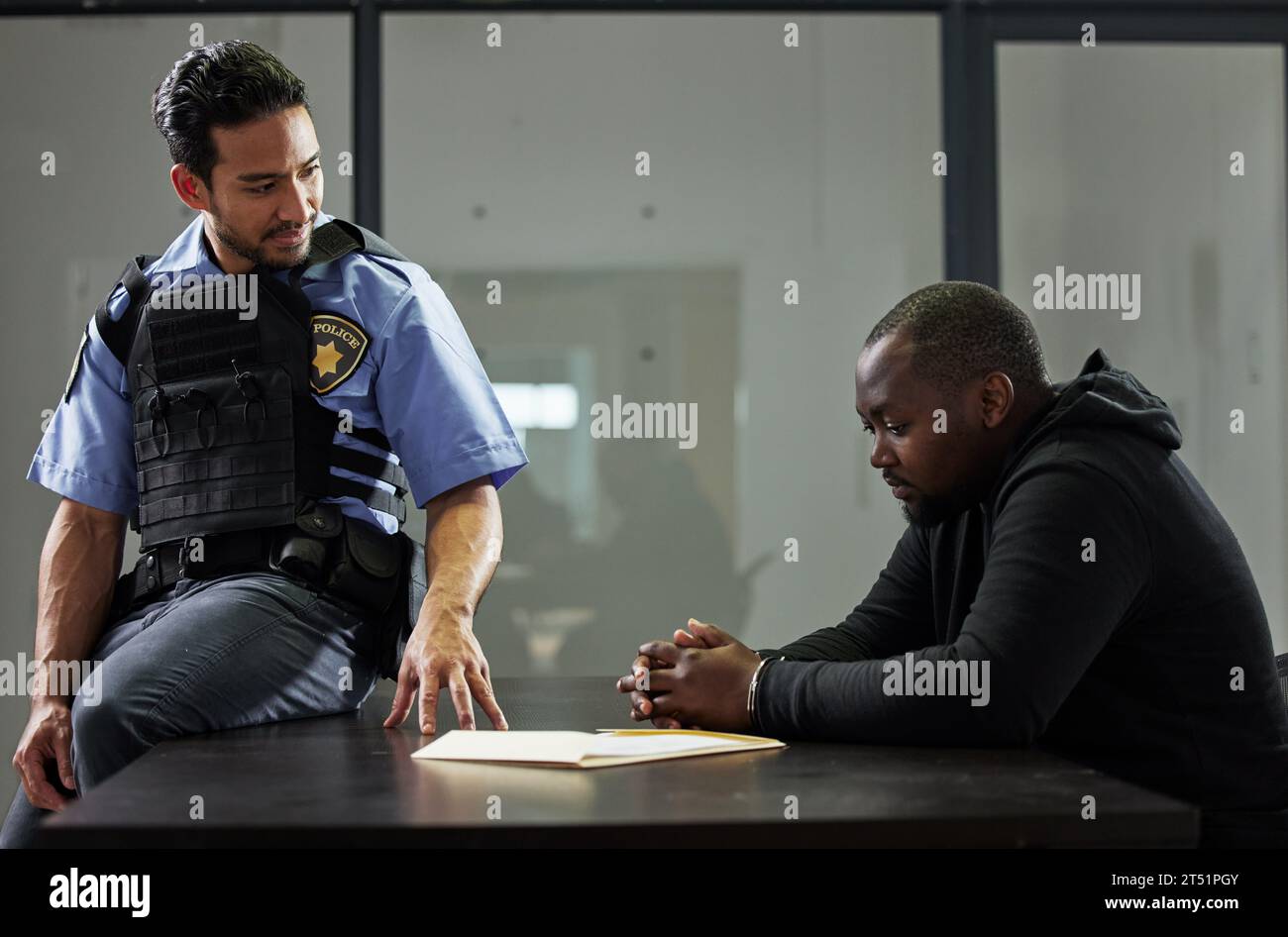 Police, interrogation and black man, suspect or criminal investigation ...