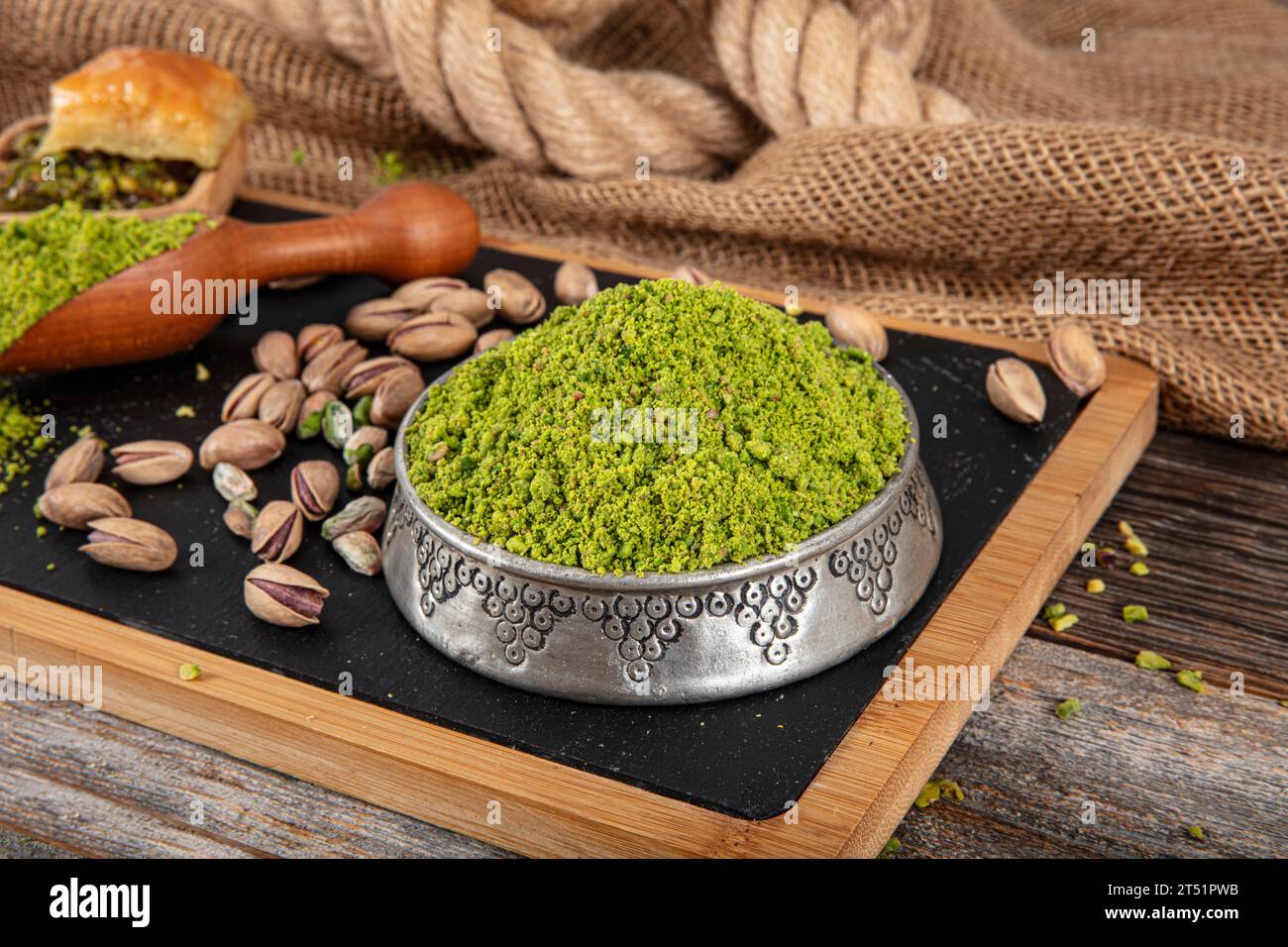 Pistachio powder. Ground, milled, crushed or granulated pistachio pile ...