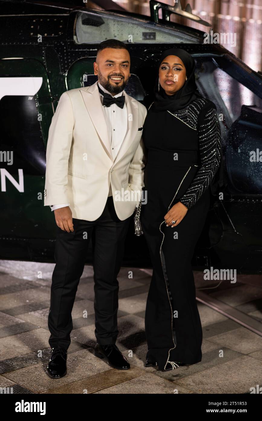 Josh Ali and Kamara Davis pose for photographers upon arrival at the ...
