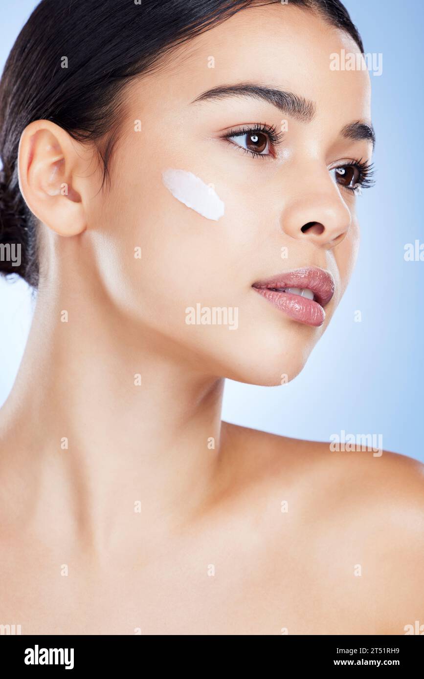 Woman, face and skincare moisturizer in cosmetics or beauty against a ...